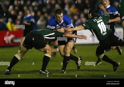Kevin Maggs Of Bath Surges Into The Tackles Of Ryan Strudwick Left And Barry Everitt Of London