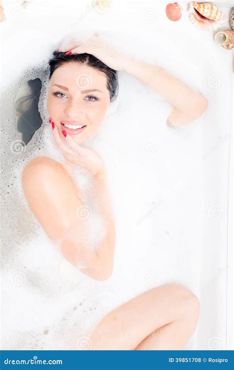 Portrait Of Attractive Beautiful Blue Eyes Young Woman Lying Relaxing