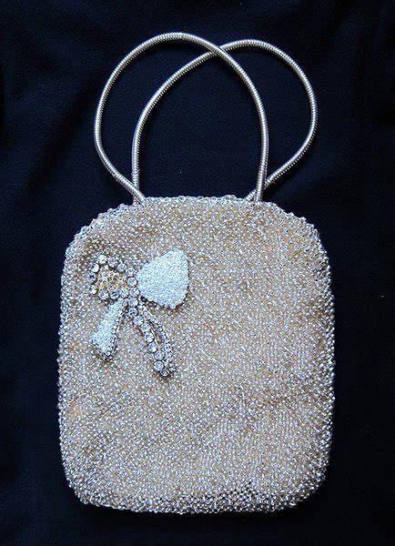 肩背包零錢包手提包方包日本名牌包裝飾假珍珠水鑚蝴蝶結塑膠繩編織包【心生活美學】 Yahoo奇摩拍賣