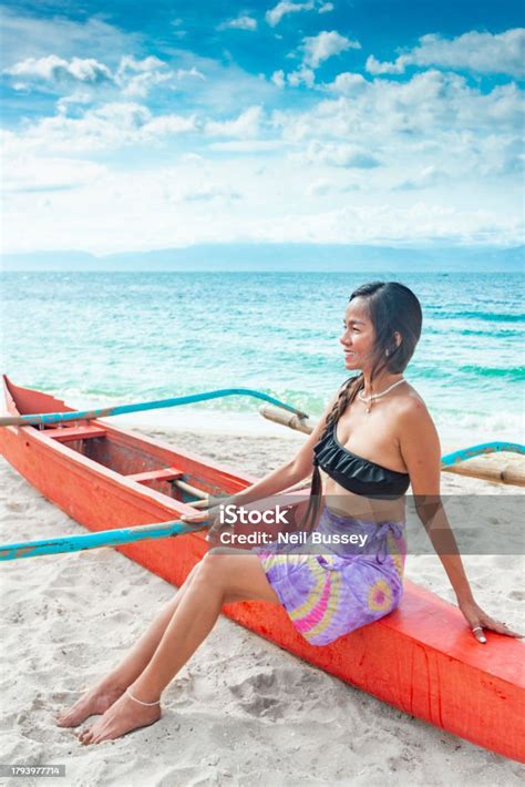 Attractive Woman Posing In Colorful Swimwearon A Boatwhite