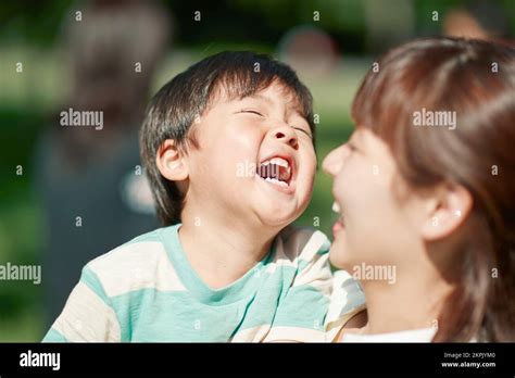Japanese Mother And Smiling Son Stock Photo Alamy