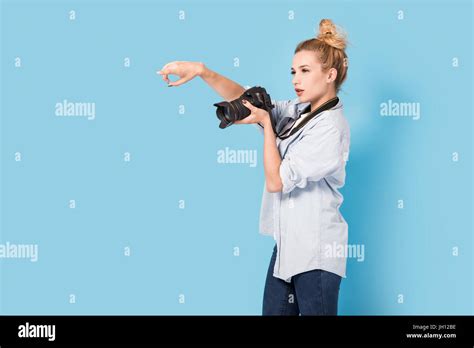 Woman Blonde Photographer Shows How To Pose To Somebody Model Isolated