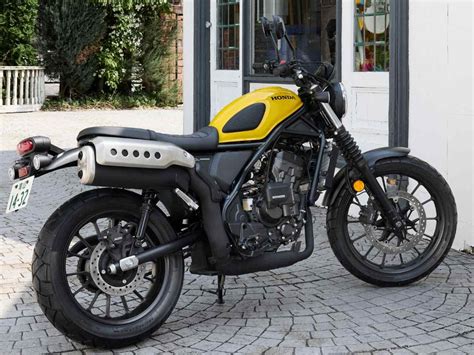 Galeria De Fotos Uma Honda 250 2026 Clássica Com Nova Tecnologia Para