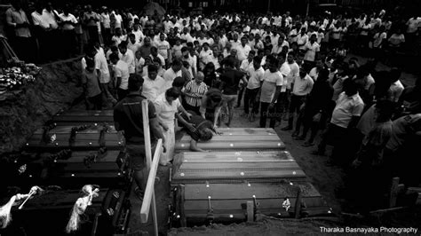 Tharaka Basnayaka On Linkedin This Unique Photograph Captures A Solemn Moment Of A Mass Burial