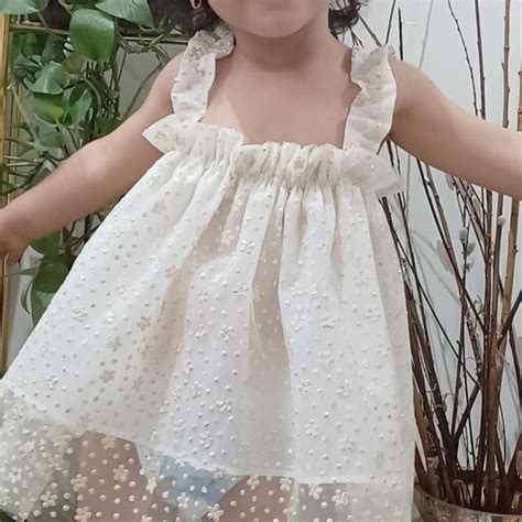 غرفه‌ فروشگاه لباس کودک آوین باسلام