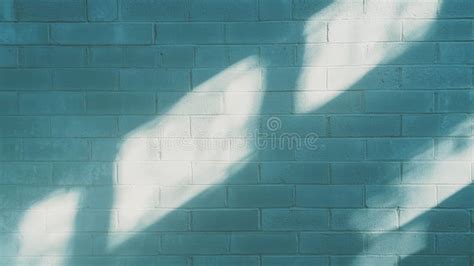 Light Grey Smooth Weathered Brick Texture With Sunlit Patterns Stock