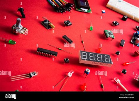 Micro Electronics Arduino Diy Components Over Red Background Top View