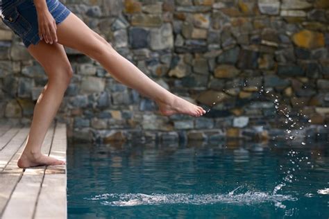Premium Photo Low Section Of Woman In Swimming Pool