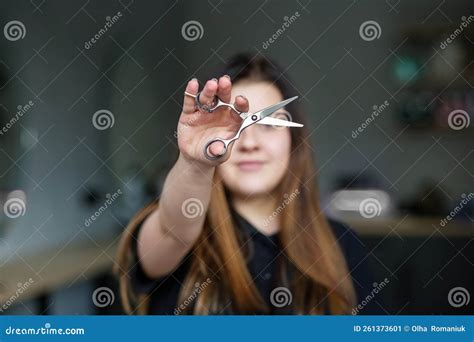 Close Up Shot Of Beautiful Girl Hairdresser Barber Scissors In Hands