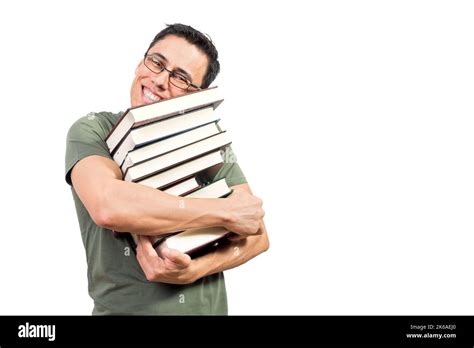 Optimistic Nerdy Man Embracing Stack Of Books Stock Photo Alamy