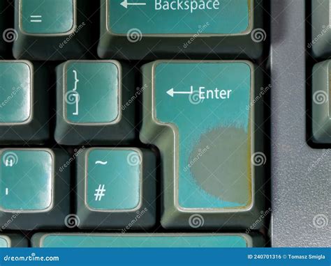 Simple Worn Faded Enter Key On An Old Computer Desktop PC Keyboard Top View From Above Detail