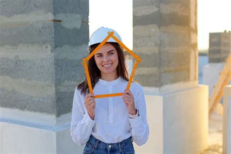 Female Architect Holding Folding Ruler Construction Site Sunset Stock Photos Free Royalty