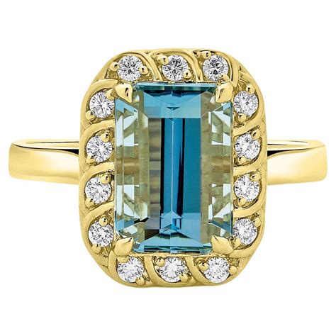 352ct Aquamarine Ring With 028tct Diamonds Set In 14k Yellow Gold For