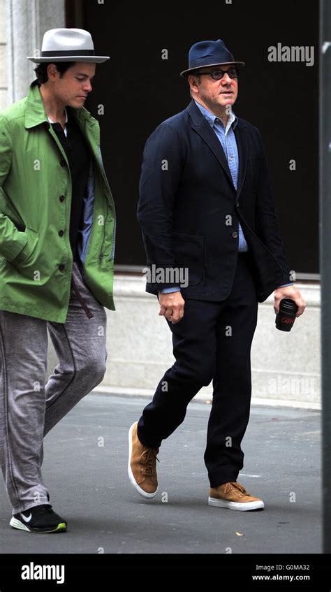 Kevin Spacey Takes A Stroll With A Friend Wearing A Suit Hat Glasses