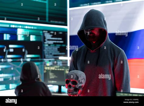 Russian Hackers Creating Dark Web Maniac Cybercrime In A Control Room Sinister Man Holding A