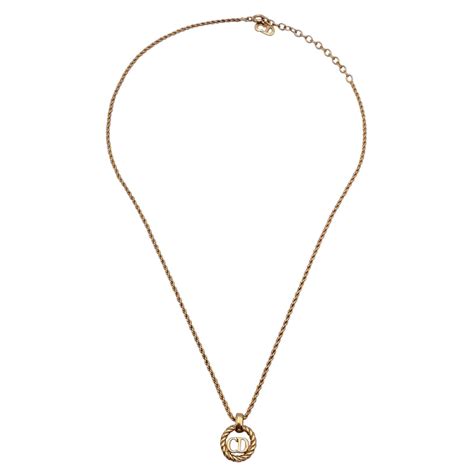 Christian Dior Gold Metal Small Cd Logo Round Pendant Gem