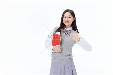 책을 들고 찬양하는 여학생 사진 무료 다운로드 Lovepik