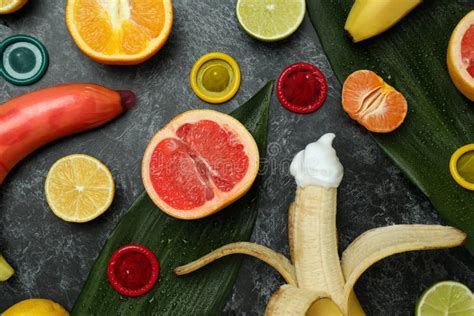 Sex Concept With Fruits And Condoms On Dark Background Stock Photo Image Of Condoms
