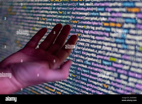 Image Shows A Person Interacting With A Large Color Coded Programming