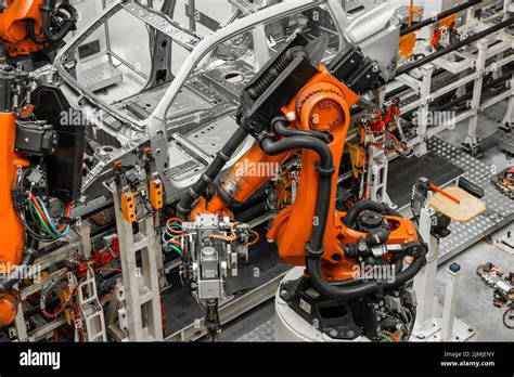 Car Bodies Are On Assembly Line Factory For Production Of Cars Modern