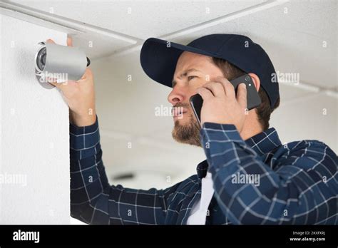 Installing Security Camera Hi Res Stock Photography And Images Alamy