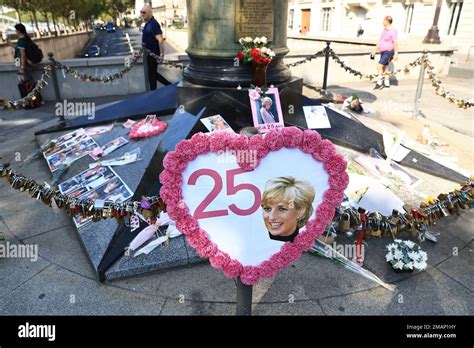 A Poster Sits By To The Unofficial Shrine To Princess Diana Wednesday