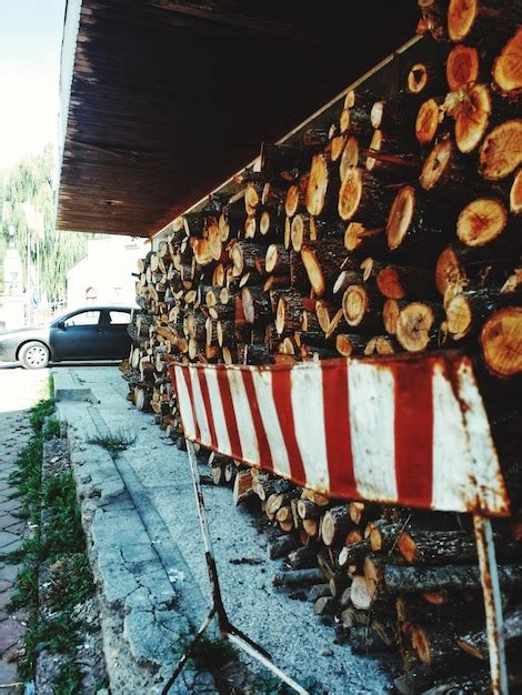 Premium Photo Close Up Of Stack Of Logs