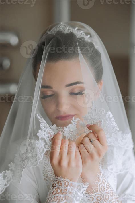 Portrait Of An Incredibly Beautiful Girl Bride In A White Robe In The