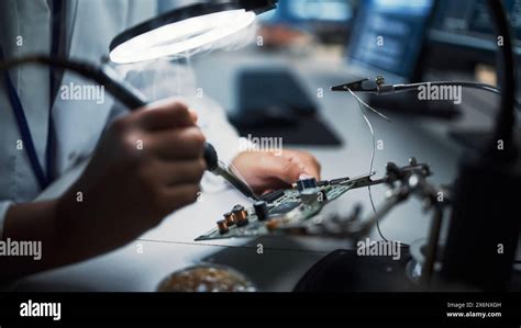 Modern Electronics Research Development Facility Female Engineer Does