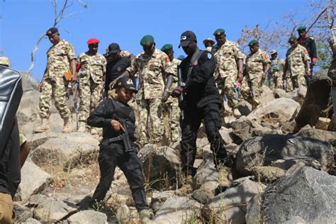 Gen Ty Buratai Climbs Hills With His Army And Police For New Year