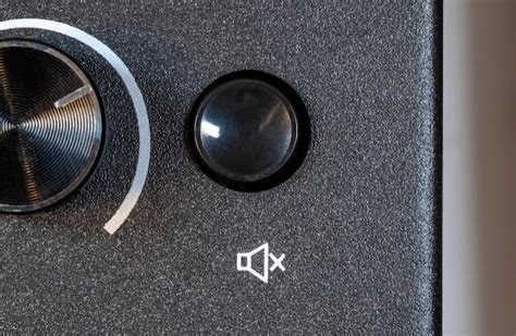 Premium Photo Closeup View Of A Simple Mute Button With A Generic Mute Symbol On A Simple