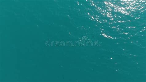 Top Down View The Camera Flies Over The Sea Waves On A Clear Day