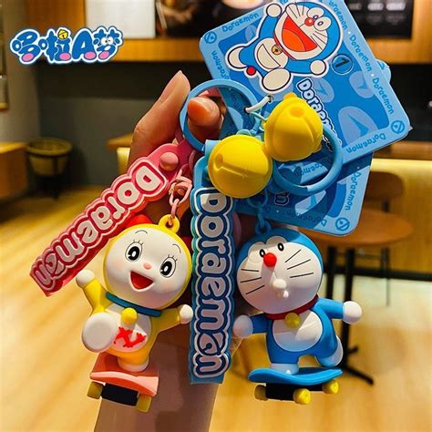 พวงกุญแจสเก ็ ตบอร ์ ดลากโดราเอมอนของแท ้ จี ้ ตุ ๊ กตาการ ์ ตูนของขวัญเล ็ กๆที ่ สร ้ างสรรค