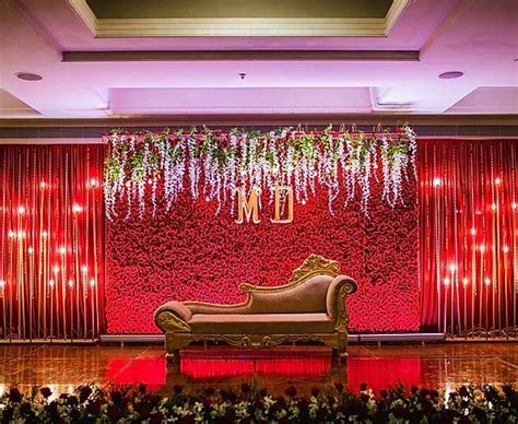 Wedding Stage Decorated With Red Flowers And Greenery Red And Gold