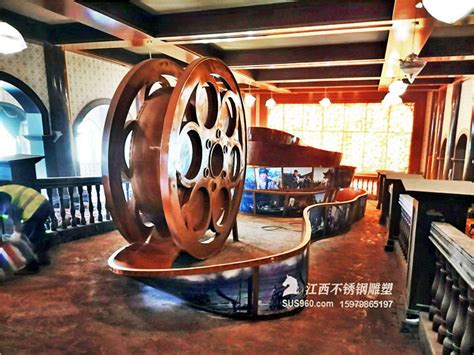 赣州方特不锈钢电影胶卷雕塑 江西赣州不锈钢雕塑江西赣州铁艺工程江西赣州铜雕塑江西赣州玻璃钢雕塑厂家设计公司