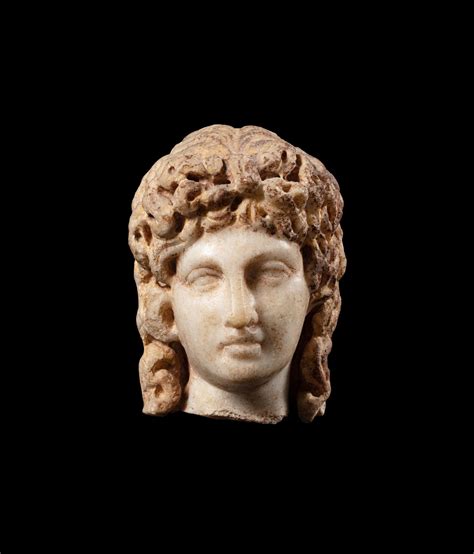 A Roman Marble Head Of The Eros Of Centocelle Circa 2nd Century Ad