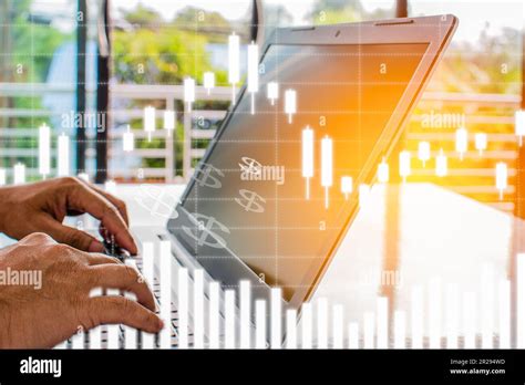 Hand Of A Businessman Typing A Notebook Keyboard To Analyze Stock