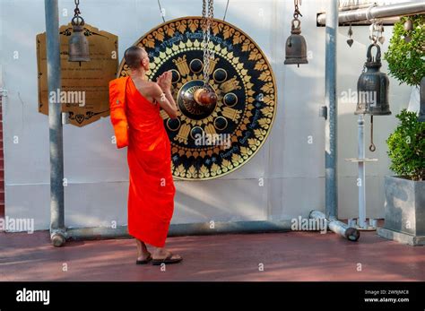 Monk In Front Of A Ritual Gong Golden Mount Bangkok Thailand Stock