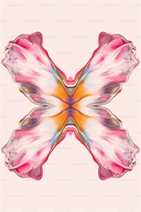 분홍색 배경에 분홍색과 노란색 나비 모양의 개체 사진 Unsplash의 추상적인 이미지