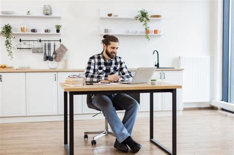 Positive Entrepreneur Discussing Company Issues Using Computer In Apartment Stock Image Image