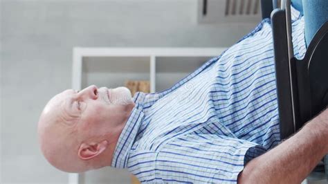 Old Man Patient In A Nursing Home Assistance Rehabilitation And