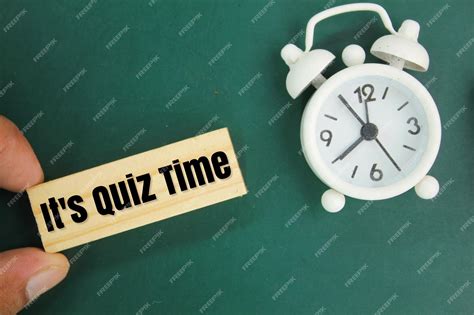 Premium Photo Bell And Stick Clock With The Words Its Quiz Time The