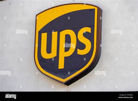 Ups Logo Displayed On A Building Facade Representing Global Shipping