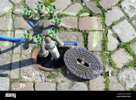 Standpipe With Water Taps At An Underground Hydrant Germany Stock
