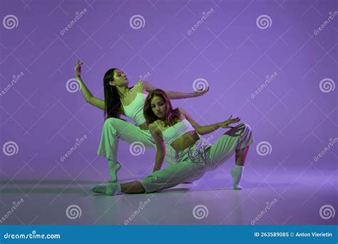 Studio Footage Of Dancing Young Girls Stylish Performance Stock Image