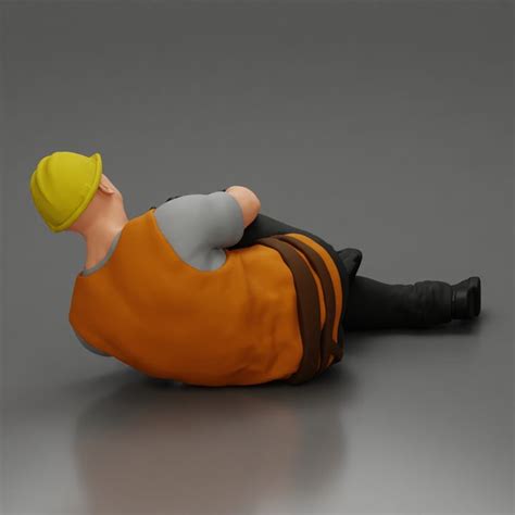 3d Printable Construction Worker Lying On The Floor Holding His Injured