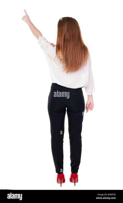 Back View Of Young Redhead Business Woman Pointing At Wall Beautiful