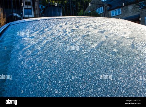 Ice Crystals From Frost Appearing As Fur Or Grass On A Car