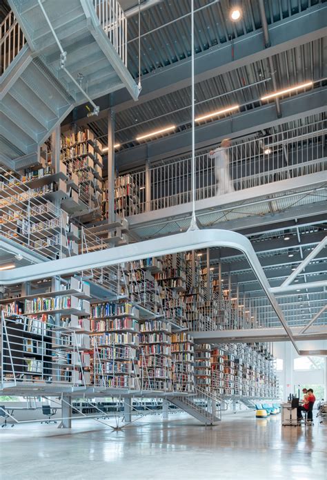 Wolfgang Tschapeller Adds Floating Bookshelves To Cornell University