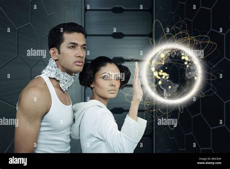 Couple Touching A Globe Stock Photo Alamy